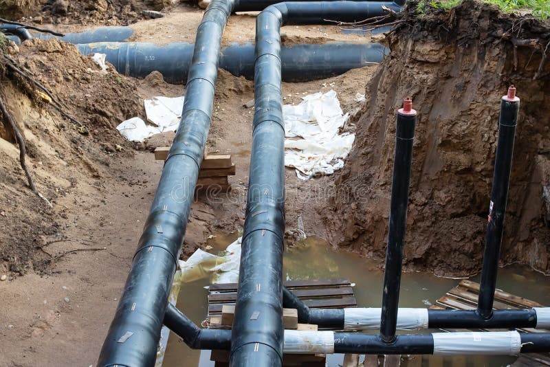Water Pipes with Insulation in the Ground Stock Image - Image of ...