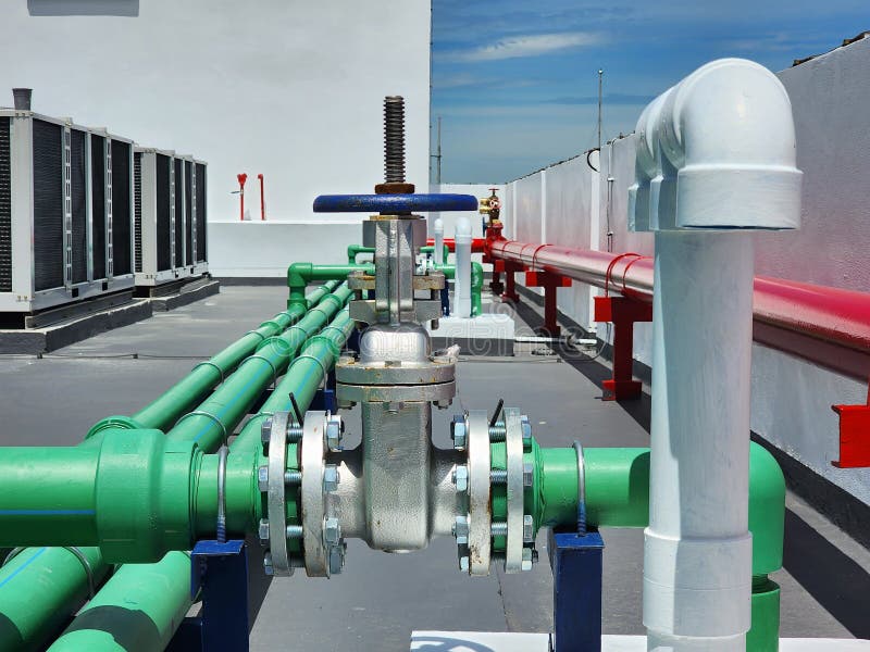 Water Pipes and Water Tanks on the Building Stock Image - Image of ...