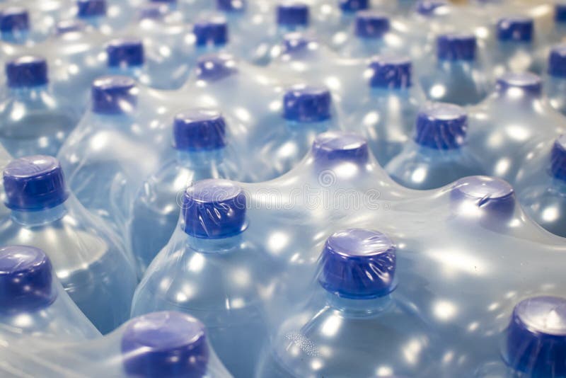 Water in plastic bottles. stock photo. Image of water - 207443422