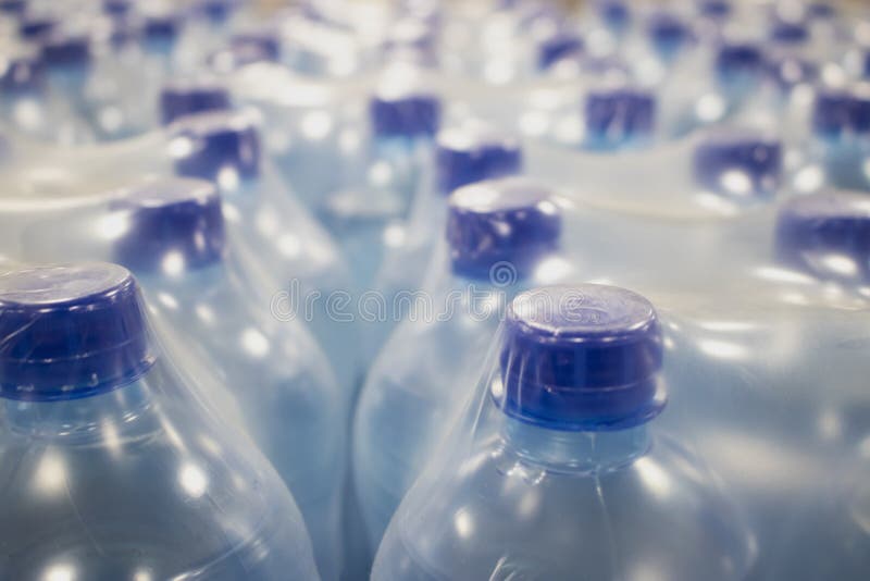 Water in plastic bottles. stock image. Image of plastic - 222672927