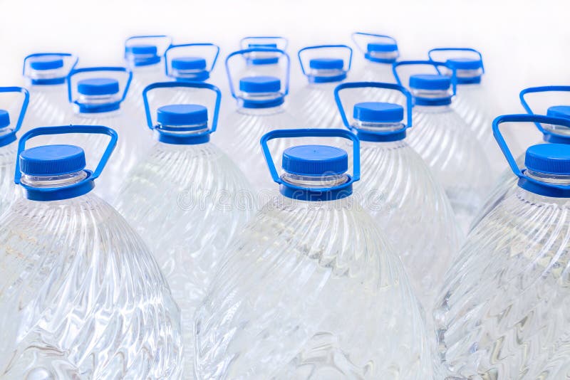 Water in Plastic Bottles on a White Background Stock Image - Image of ...