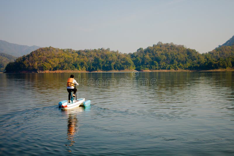 Water play in the river stock photo. Image of evergreen - 50036962