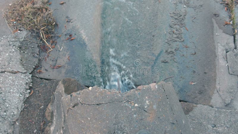 Water Pollution Discharge from the Drain. Top View. Stock Video - Video ...