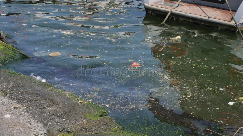 Water Pollution with Garbage on Water Stock Video - Video of unhygienic ...