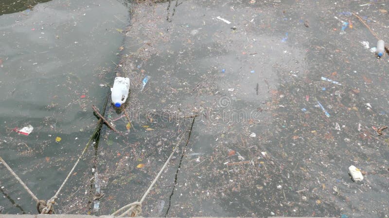 Water Pollution with Garbage on Water Stock Footage - Video of shore ...