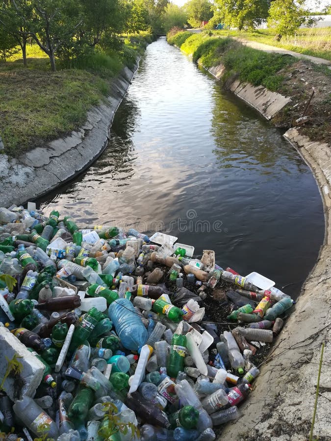 Water Pollution, Plastic Bottles and Garbage on River Surface Editorial ... Water Pollution, Plastic Bottles and Garbage on River Surface Editorial ...