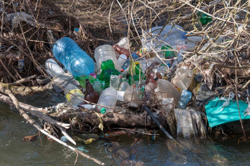 Plastic And Foam Garbage Floating On The Surface Of The River Stock ...