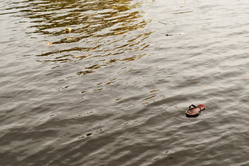 Water Pollution : Slippers Floating at a River Stock Photo - Image of ...