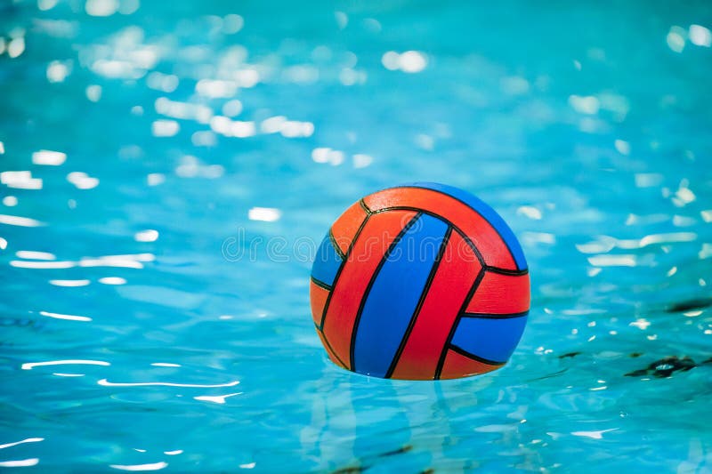 A Water Polo Ball Floating on the Water in a Pool. Stock Photo - Image ...
