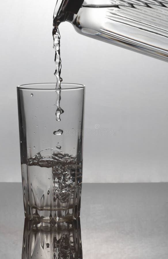 Water poured into a glass stock image. Image of glass - 63699719