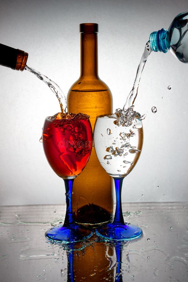 Water is Poured into Glass Glasses Standing on Glass Stock Photo ...