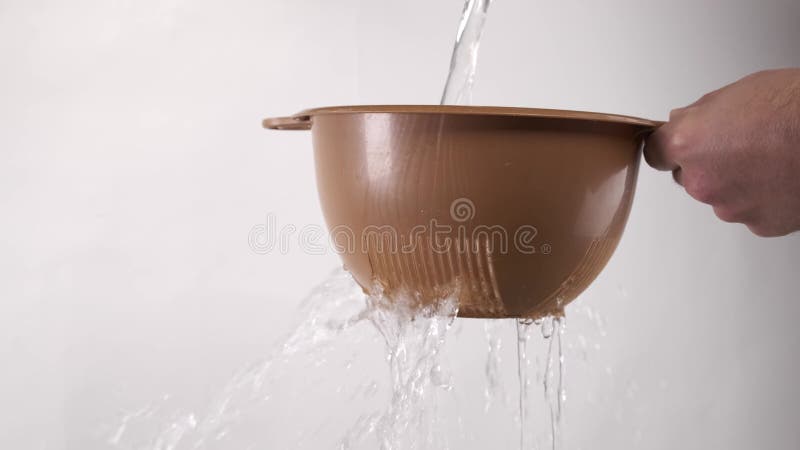 Water is Poured Over Dried Leaves for Brewing Herbal Tea in a Simple ...