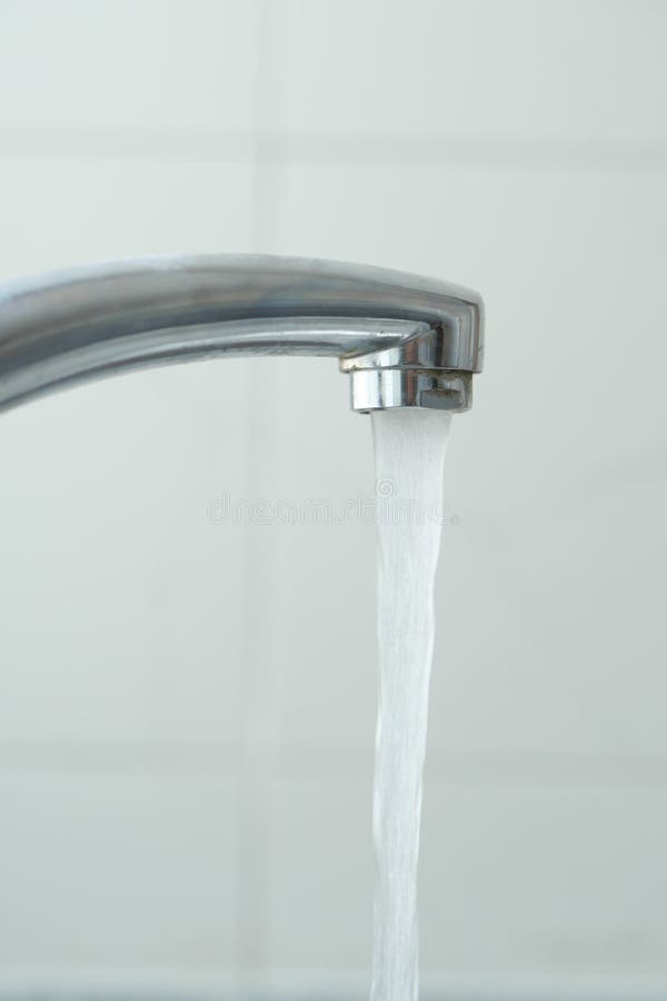 Water Pouring from a Faucet Tap Slow Motion Stock Photo - Image of sink ...
