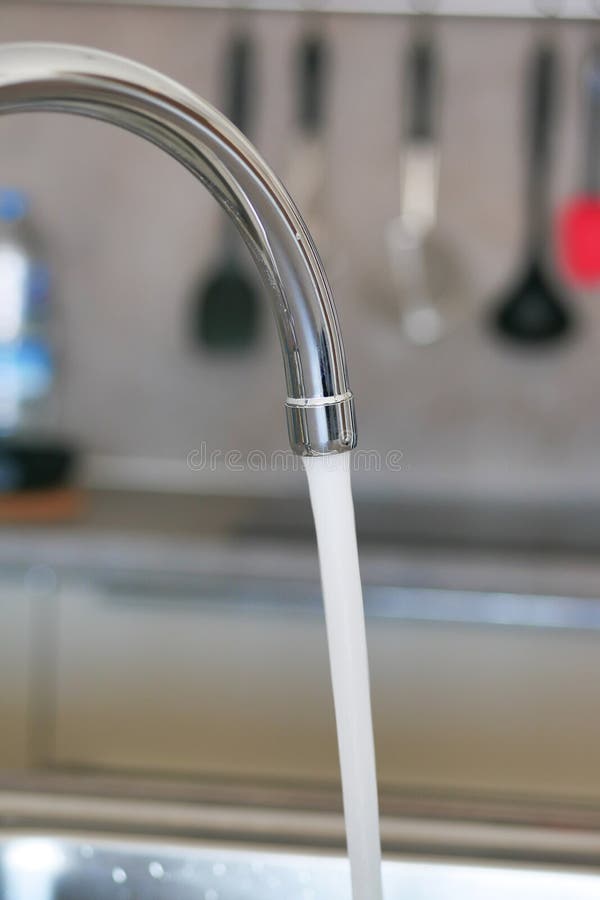 Water Pouring from a Faucet Tap Slow Motion Stock Photo - Image of ...