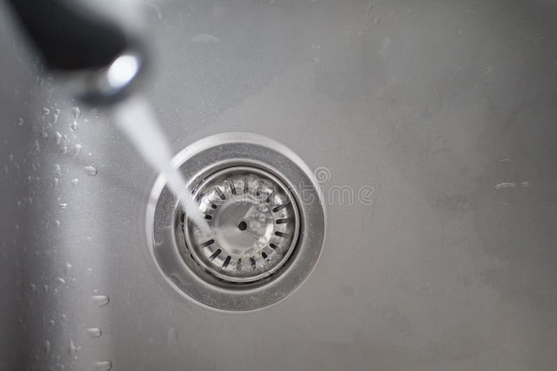 Water Pouring from a Faucet Tap Slow Motion Stock Photo - Image of ...