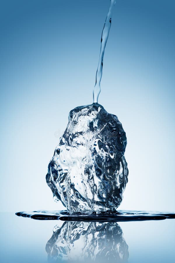 Water pouring on ice stock photo. Image of melting, details - 24826328