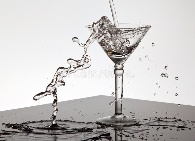 Water Pouring into a Martini Glass Stock Image - Image of pattern ...