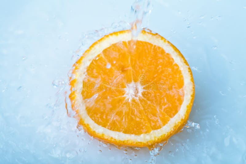 Water Pouring Over Half Orange Stock Image - Image of citrus, fall: 7777745