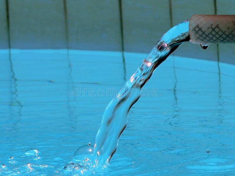 Water pouring from pipe stock photo. Image of liquid, splashes - 1730412