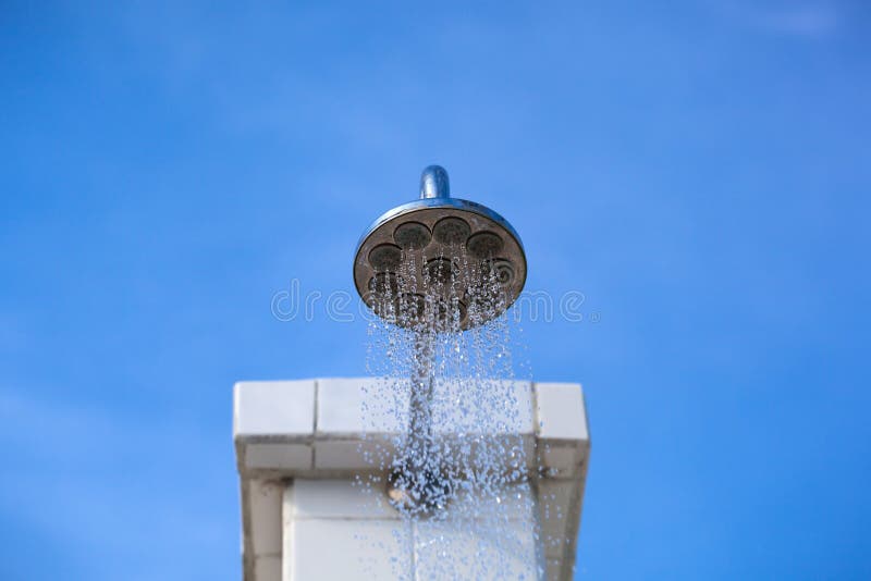 Water pouring from shower stock photo. Image of purity - 190352694