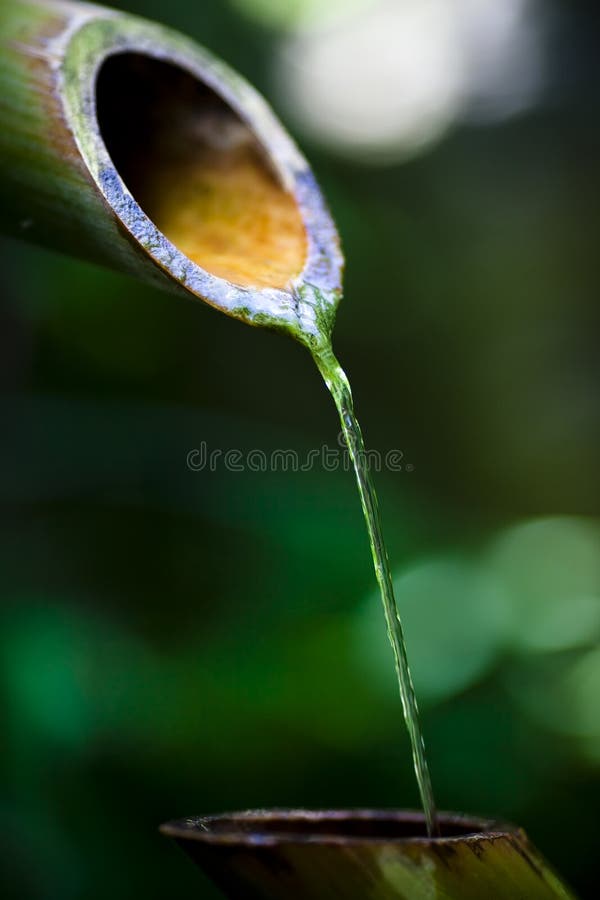 Water pouring from spout stock photo. Image of fountain - 15759594