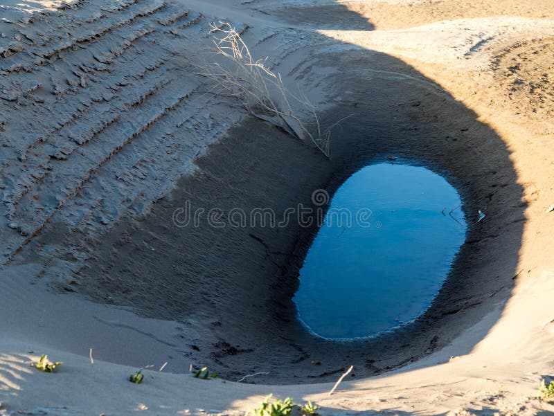 Water in Puddles on the Sand in the Desert Stock Image - Image of road ...