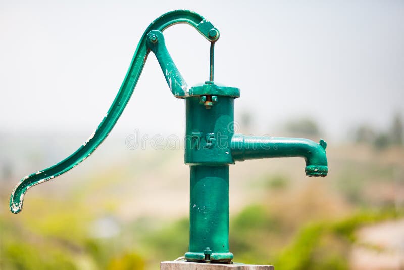 Old Green Hand Water Pump Isolated. Stock Photo - Image of metal ...