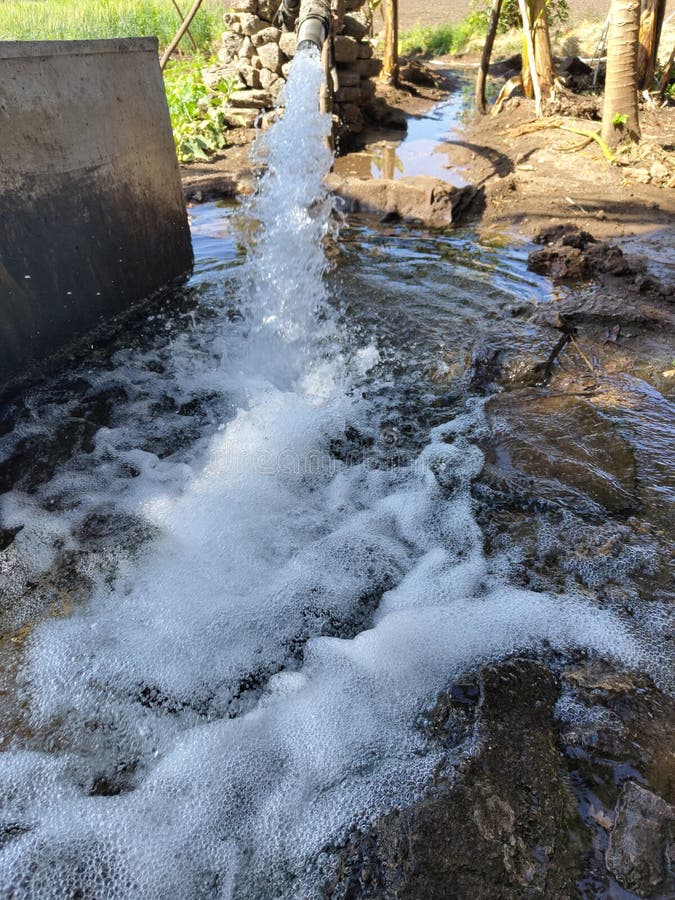 Water pump spewing water stock photo. Image of rapid - 267591210
