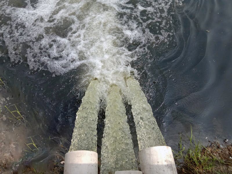 Water Pump with a Splash on the Pond for Hatchery Stock Image - Image ...