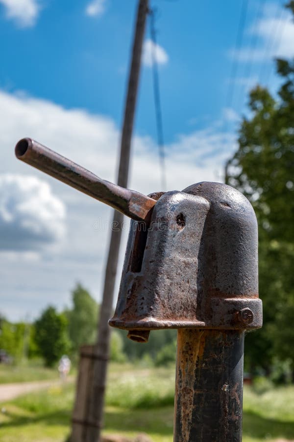Metal Rusty Water Pump in Sunlight Stock Image - Image of construction ...