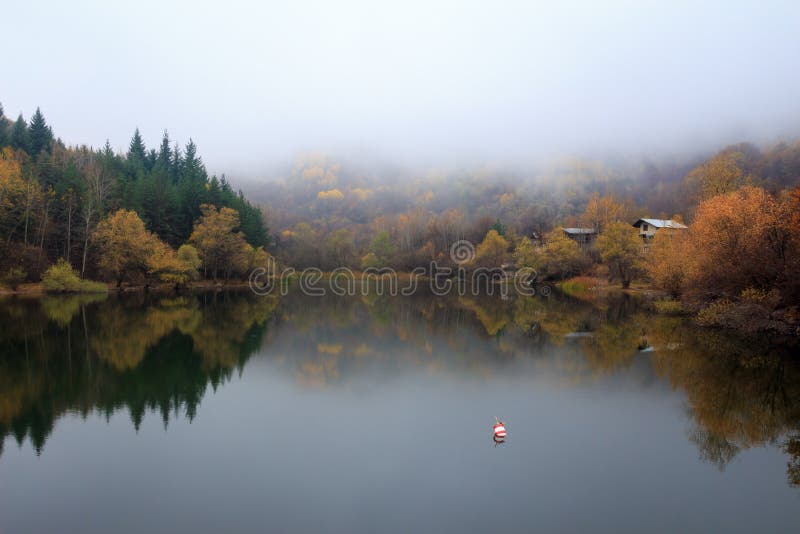 Autumn lake reflection stock image. Image of housedawn - 164674085