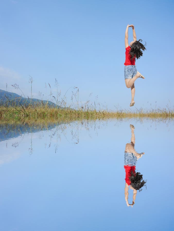 Water Reflection Happy Woman Jumping with Blue Sky Stock Photo - Image ...