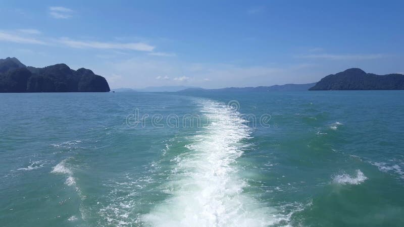 Water Ripples Forming Behind Speed Boat in Phi Phi Island Stock Footage ...