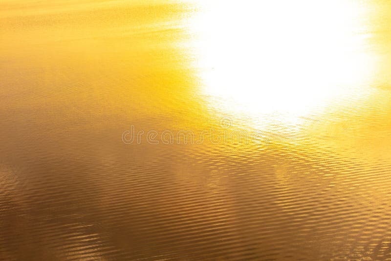 Water Ripples in Golden Tones. Abstract Background and Texture for ...
