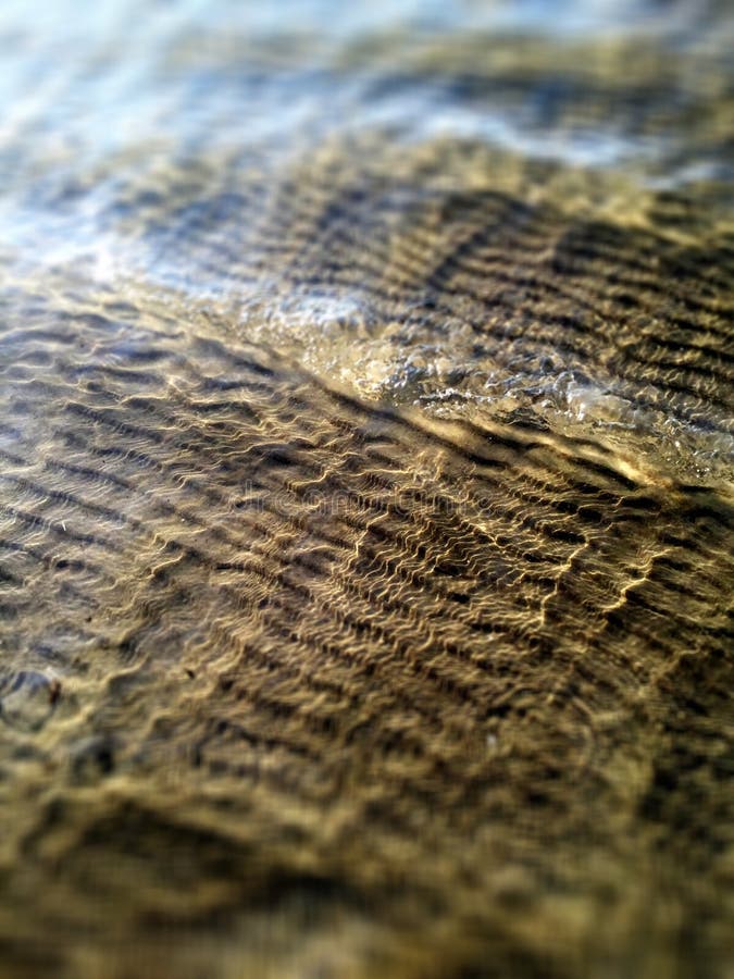 Sand Ripples In Shallow Water Stock Photo - Image of clean, waves: 7403060