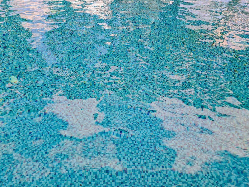 The Water Ripples in the Swimming Pool and the Pattern of the Tiled ...