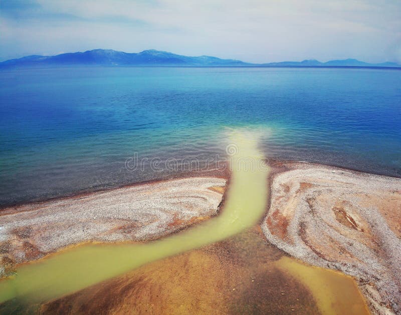 The Water of the River Mixing with the Sea Stock Photo - Image of coast ...