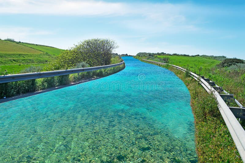 Water on the road stock image. Image of flood, road - 148361343