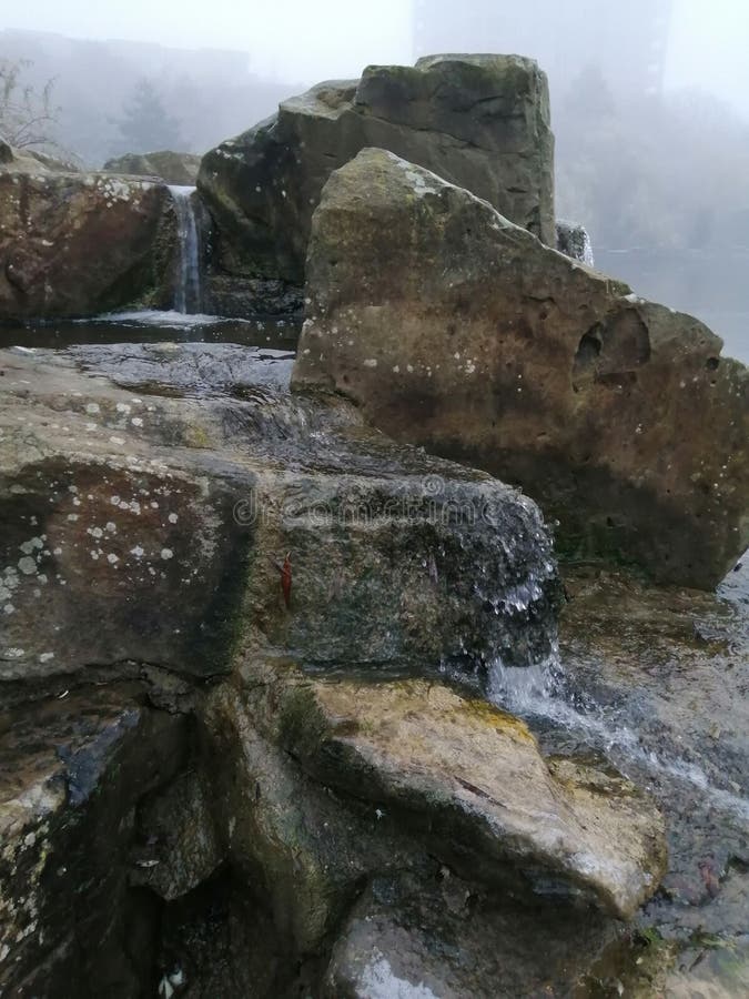 Water and Rocks on a Cold Day Stock Image - Image of structure, rock ...