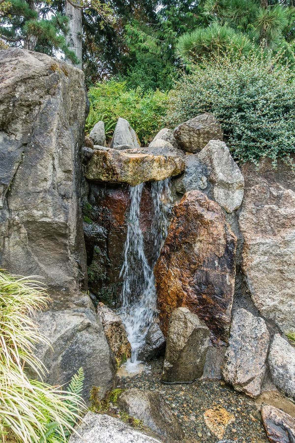 Water and Rocks stock photo. Image of flowing, water - 100518680