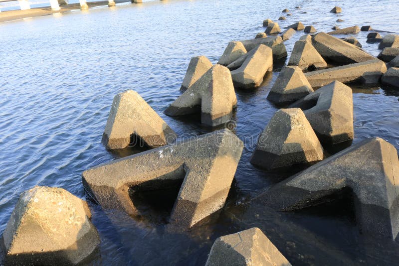 Water and rocks stock image. Image of triangle, floating - 135520931