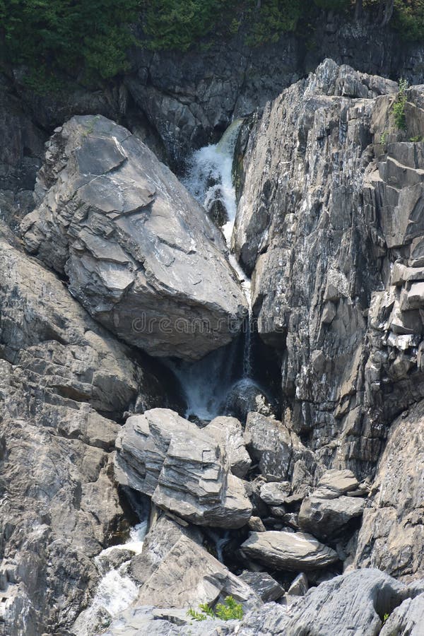 Water through rocks stock photo. Image of rocky, nature - 165667702