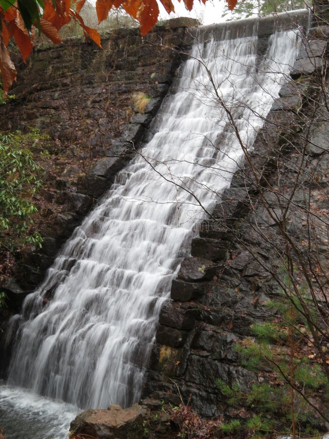 Water Running Down Rock Dam Stock Image - Image of vertical, running ...