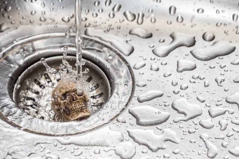 Water Running Down with Skull. Stock Photo - Image of dirty, drops ...