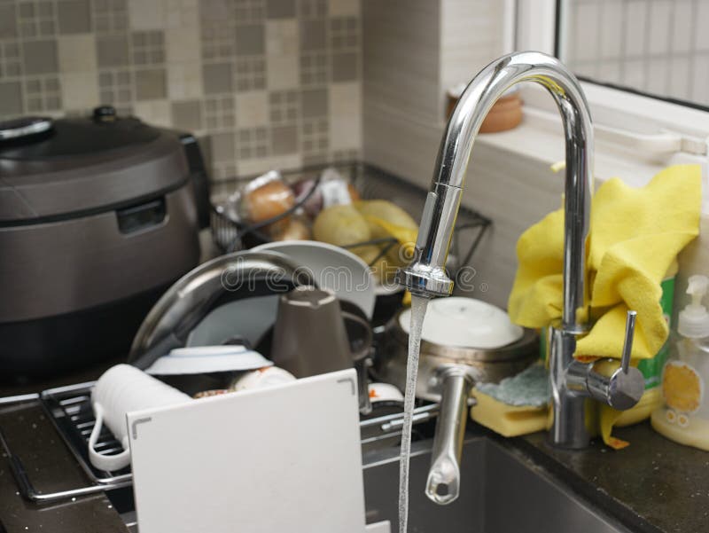 Wahing and Rinsing stock image. Image of kitchenware - 115921139