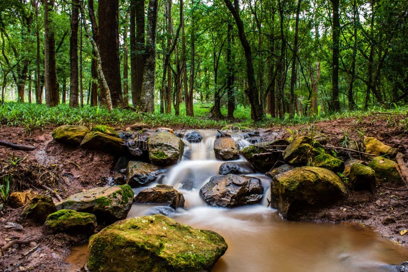 Water running over rocks stock image. Image of waterfall - 180043065