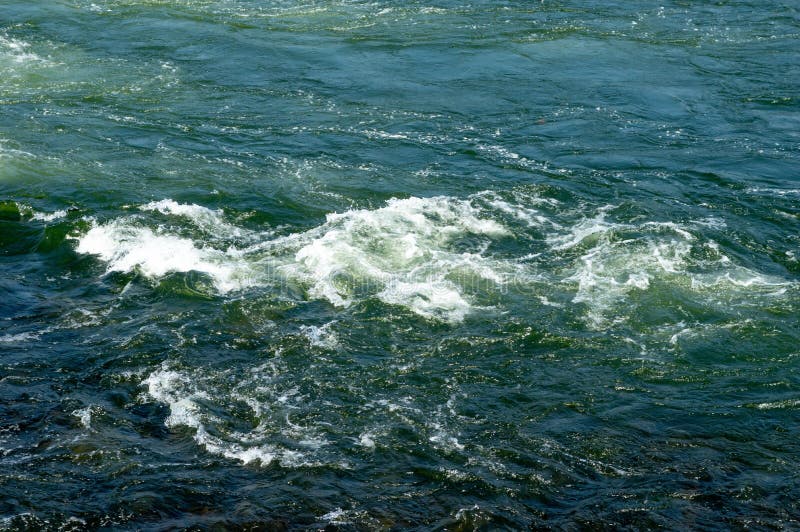 Water Running over Rocks stock photo. Image of water - 128903114