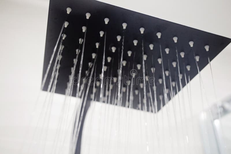 Water Running from Shower Head and Faucet in the Bathroom Stock Image ...