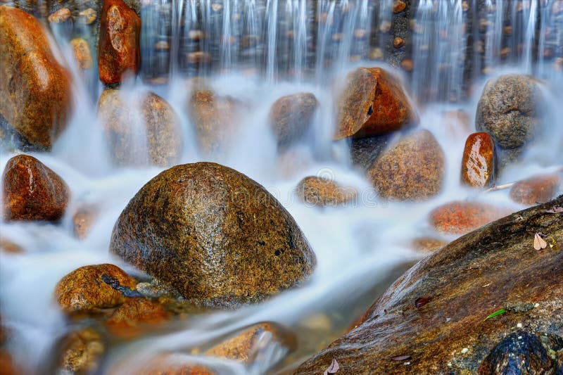 Water running with stone stock photo. Image of riverbed - 25436566