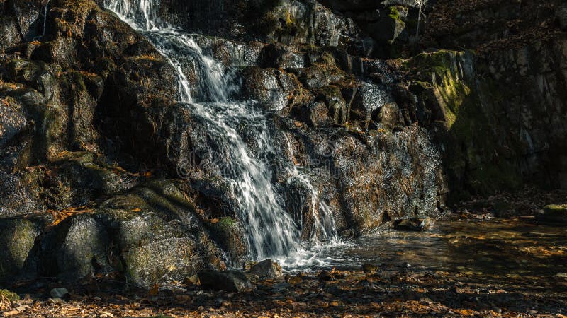 Water runs down the rocks. stock image. Image of stream - 236707133